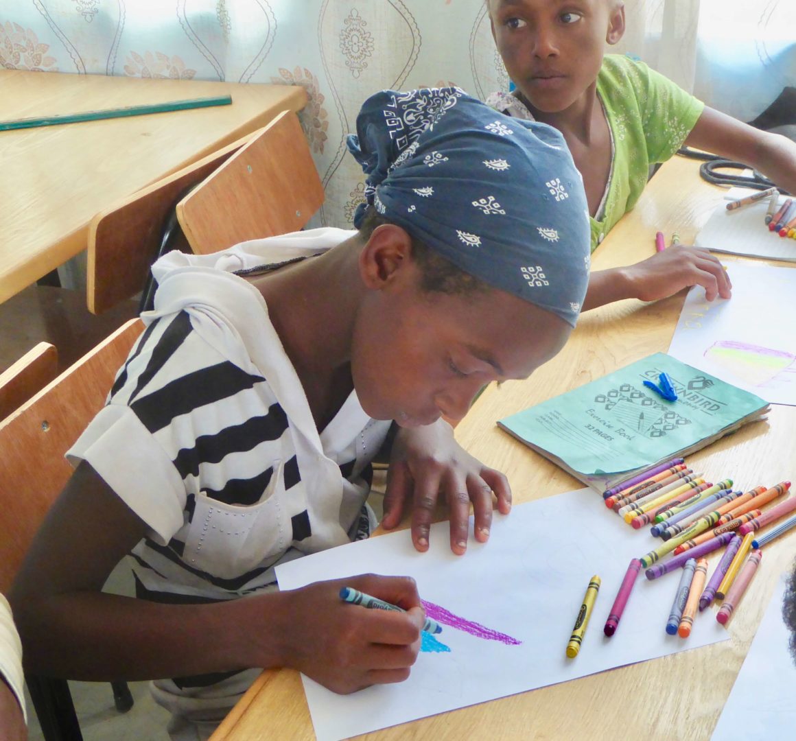 Adanu, a happy 13-year old first grader